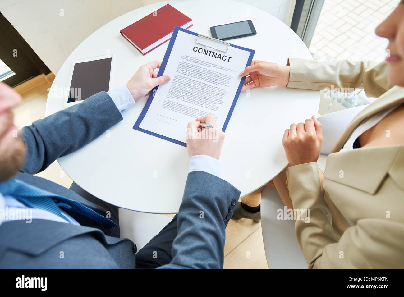 Business People Signing Contract Above View Stock Photo - Alamy