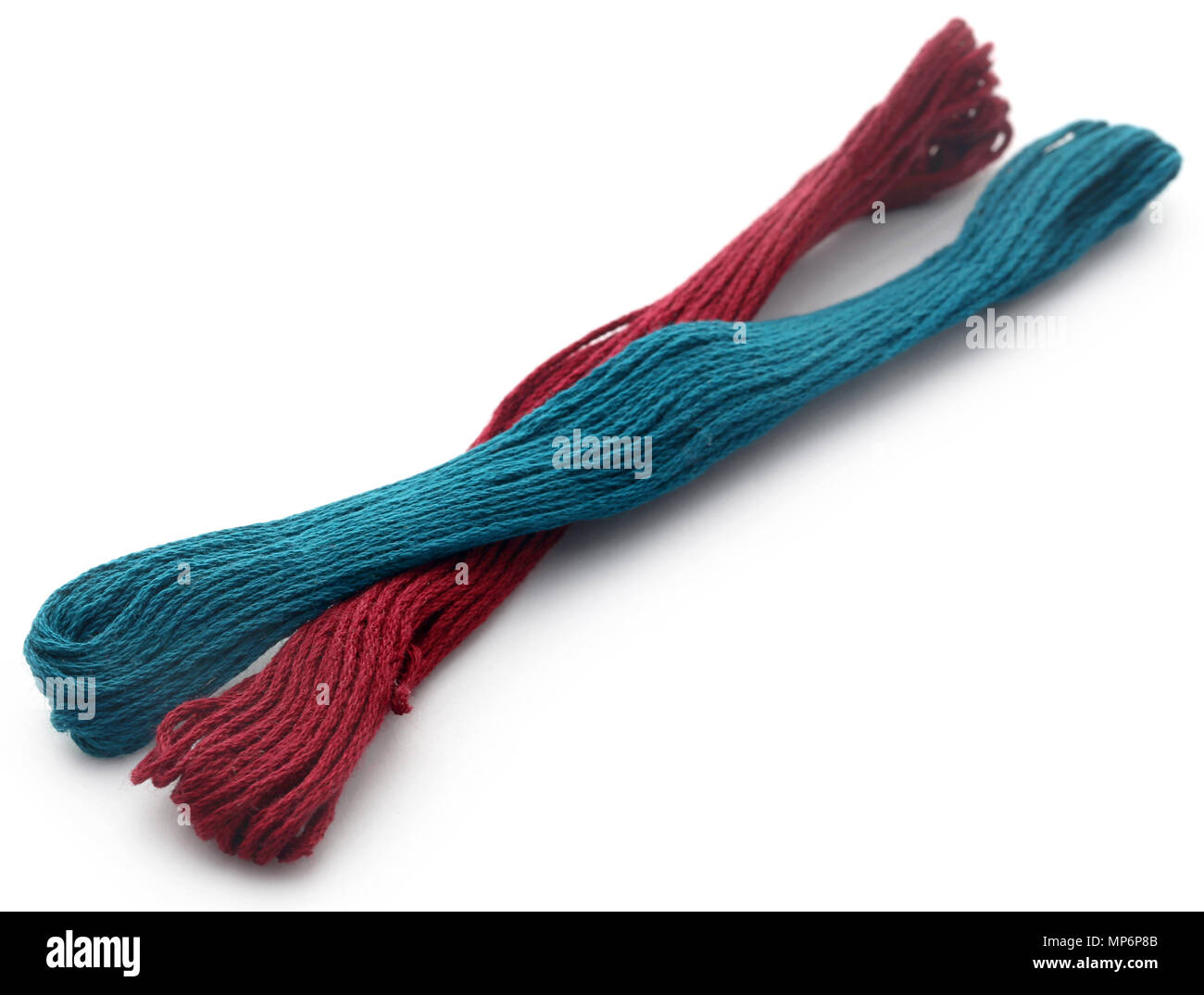 Woolen thread over white background Stock Photo - Alamy