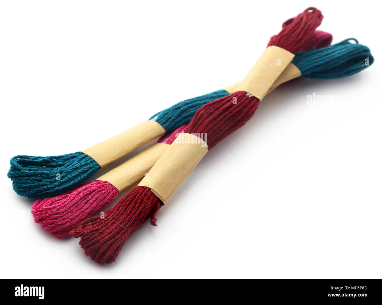 Woolen thread over white background Stock Photo - Alamy