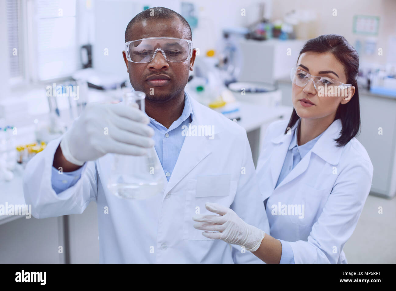 Researchers carrying out scientific hi-res stock photography and images ...
