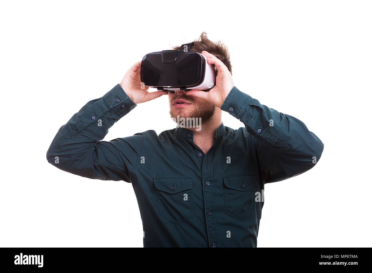 Young man wears a VR virtual reality headset Stock Photo - Alamy