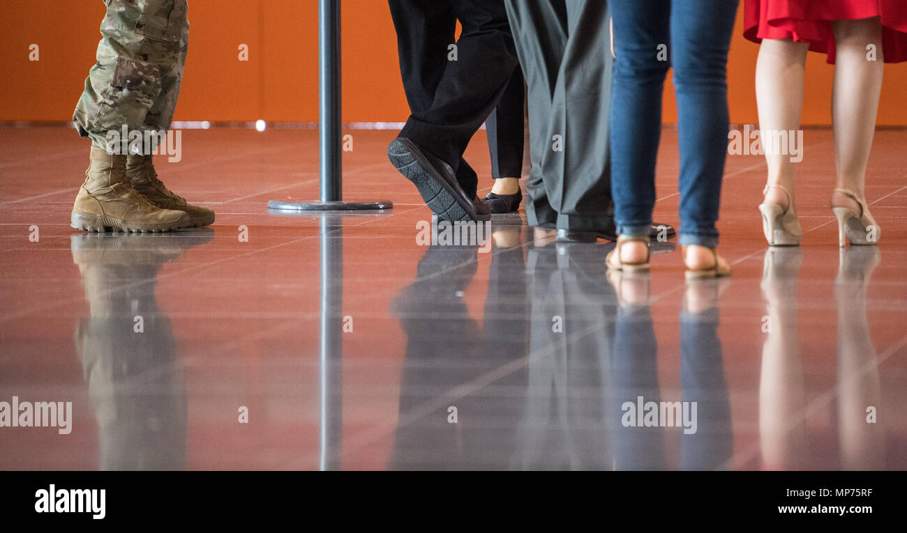 15 May 2018, Germany, Stuttgart: Visitors awaiting at the entrance of the ITEC fair for military ...