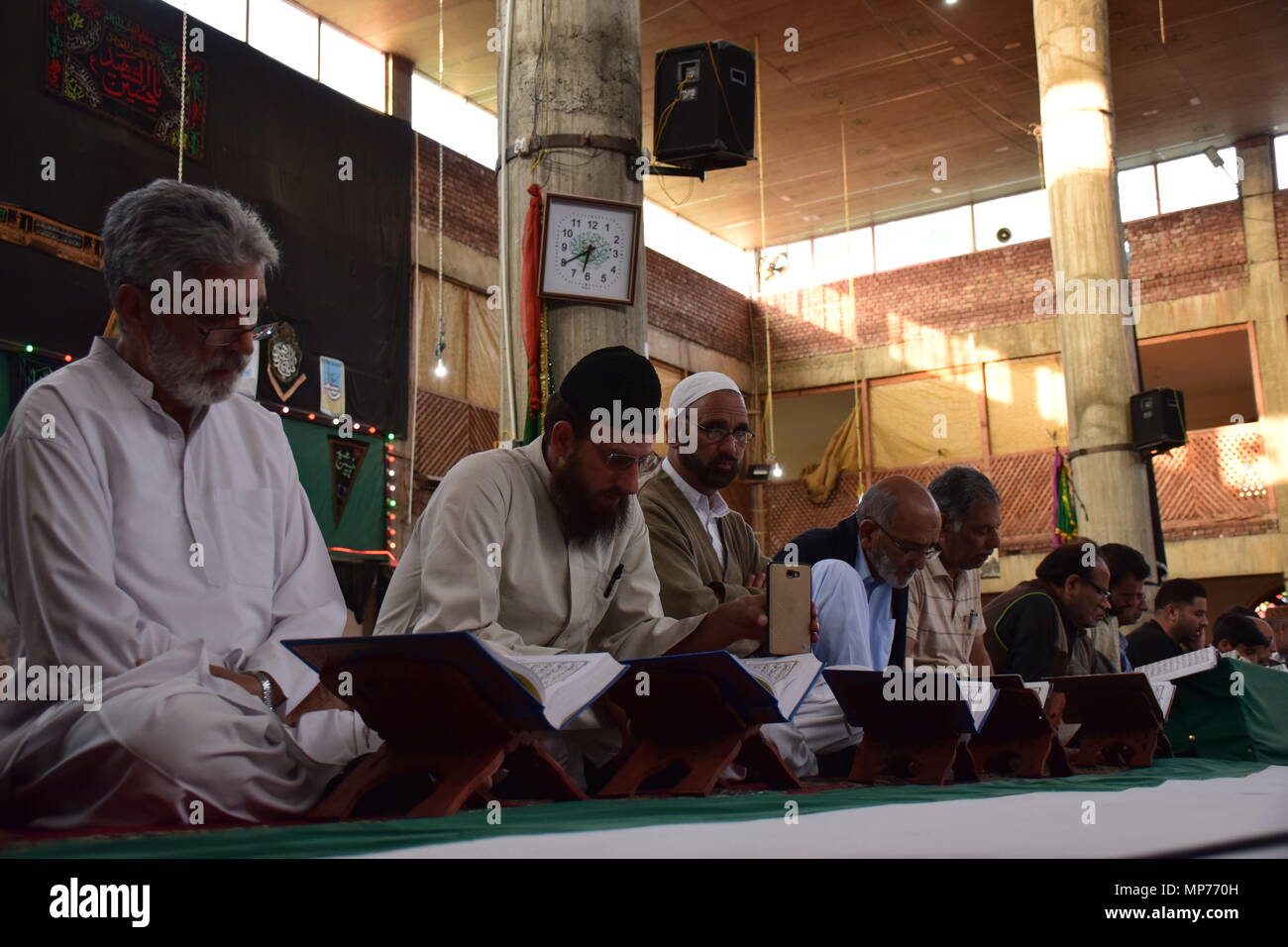 Kashmiri Muslims recite Al-Quran during the Khatam Al-Quran ceremony in ...