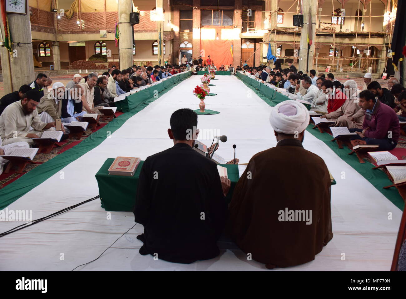 Kashmiri Muslims recite Al-Quran during the Khatam Al-Quran ceremony in ...