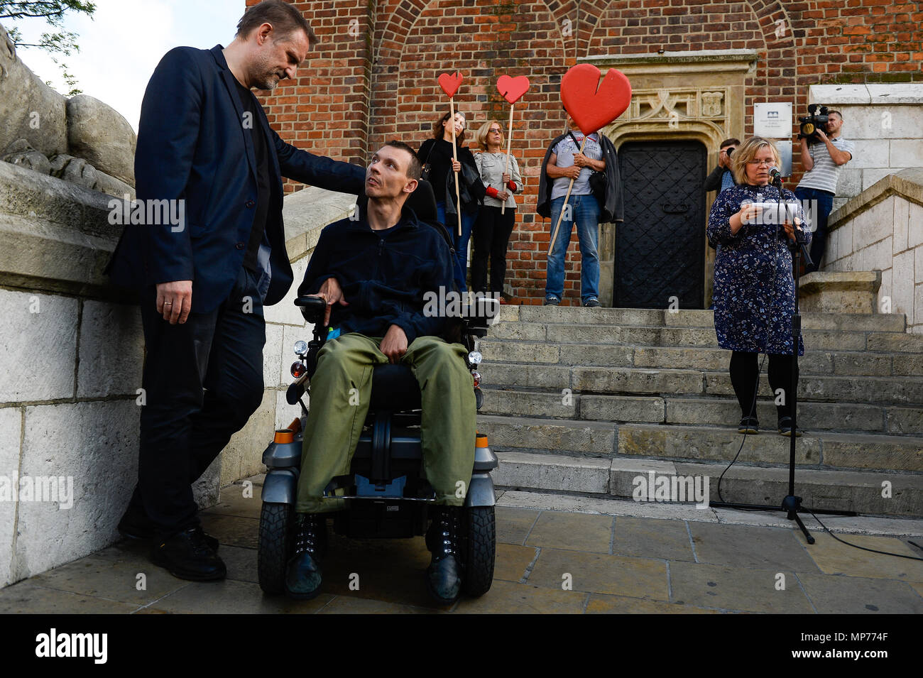 A man in a wheelchair seen attending a protest to show solidarity for ...