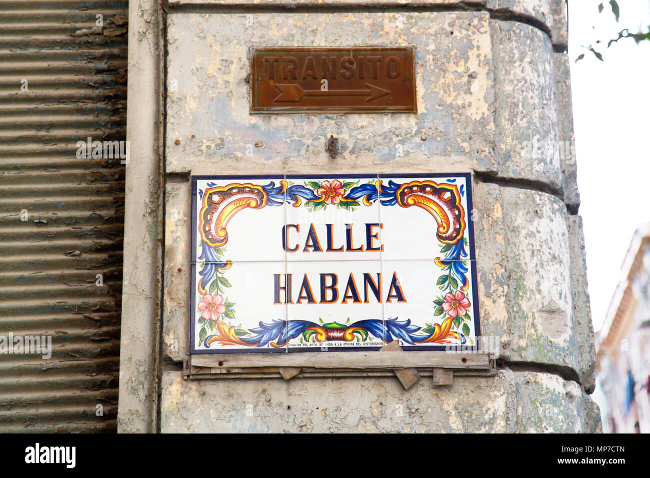 Traffic sign for tansit street and sign of name of street against old ...