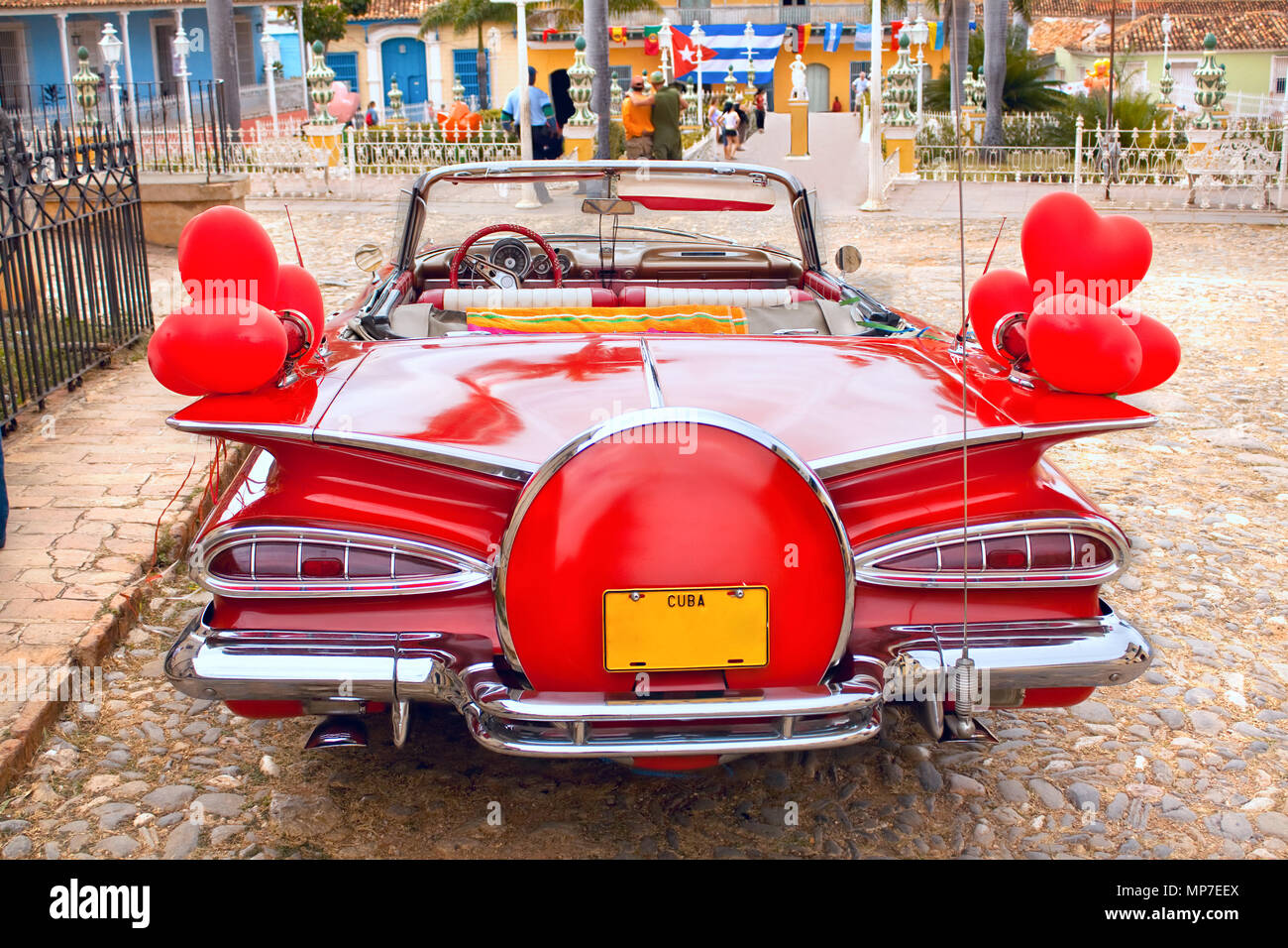 Red oldtimer car from back in the streets of Trinidad, Cuba Stock Photo ...