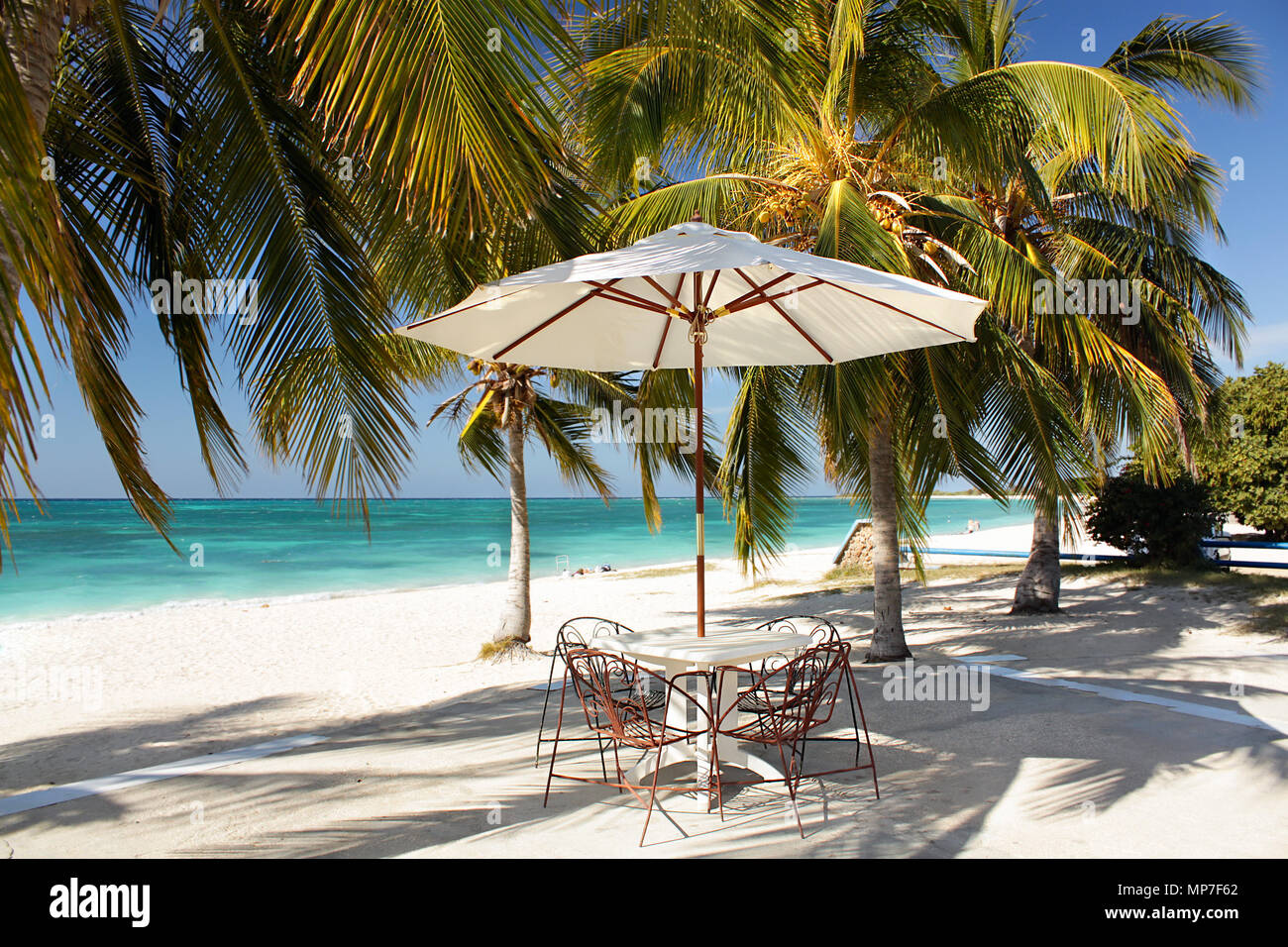Caribbean Island Paradise. Table setting at beach cafe. Trinidad , Cuba ...
