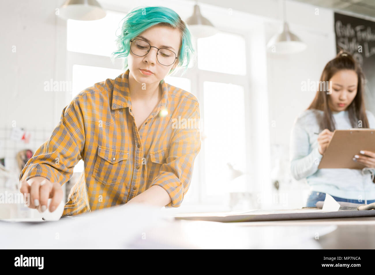 Fashion Designers Sewing Clothes Stock Photo - Alamy