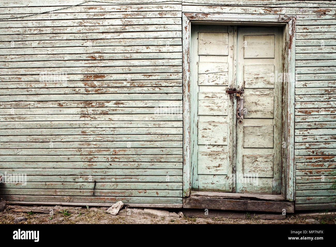 Old decayed rotten door in a wood plank wall Stock Photo - Alamy