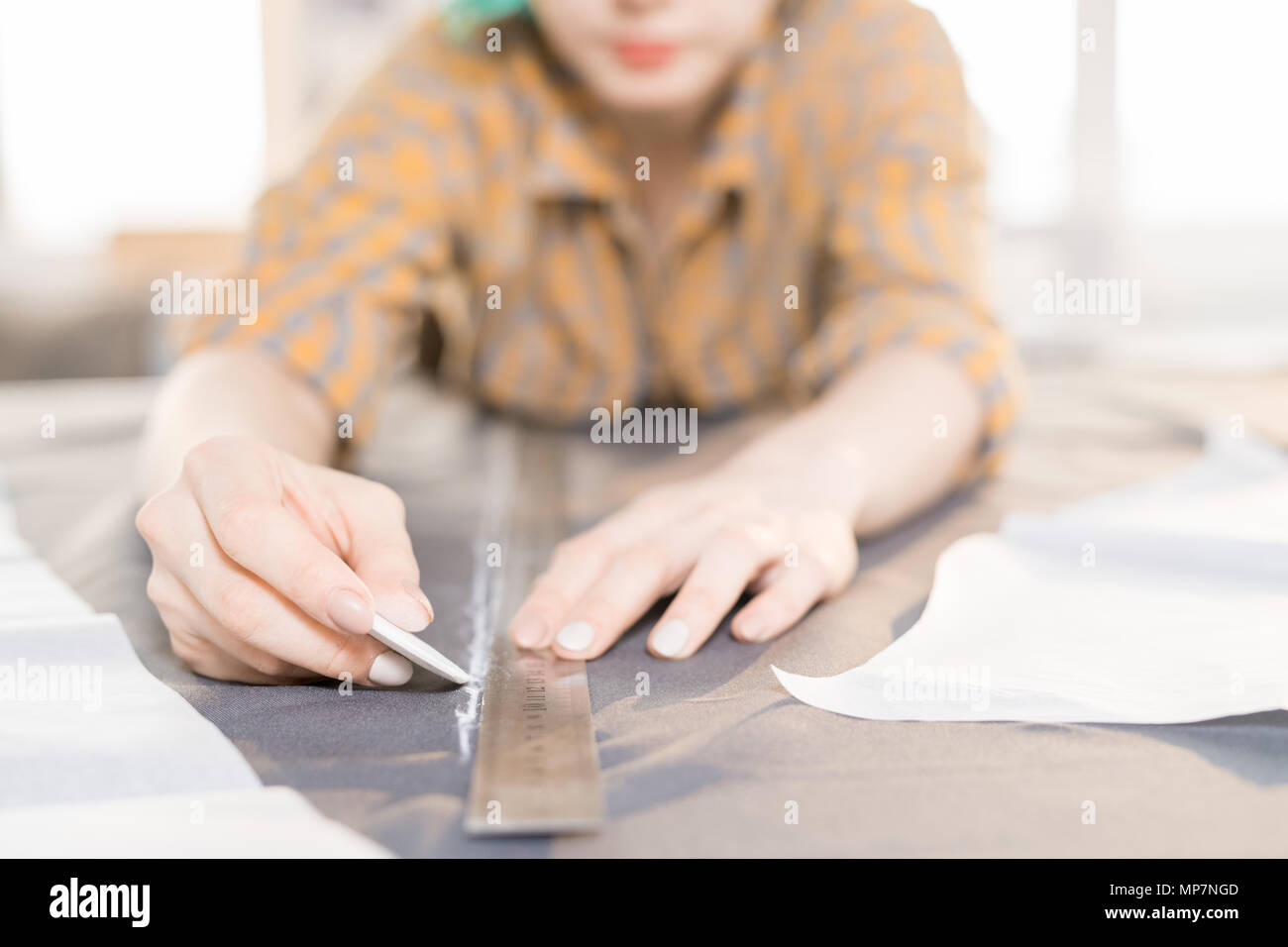 Fashion Designer Tracing Fabric Stock Photo - Alamy