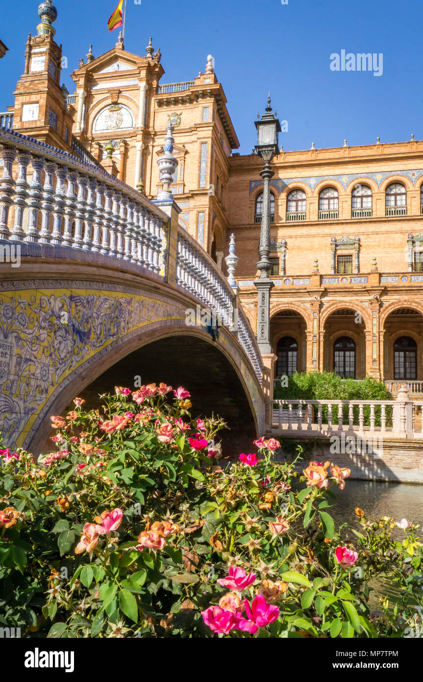 Bridge and flowers on plaza de Espana spain square in Sevilla in the ...