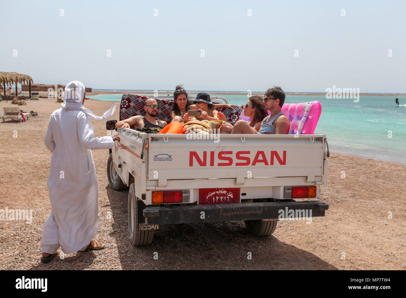 Local transport, Tourists in a pickup truck. Blue Lagoon (Dahab), Sinai ...