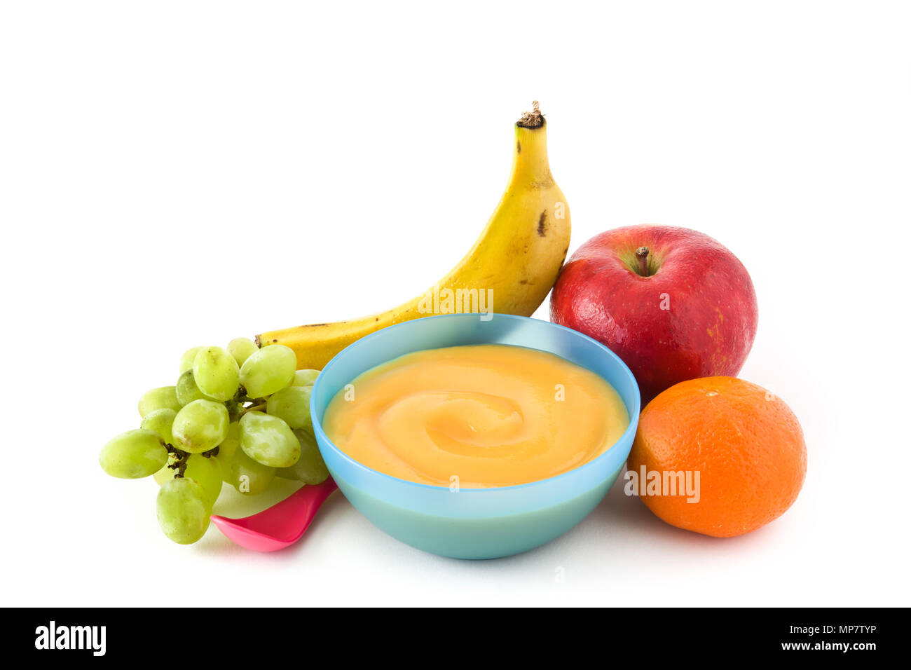 Baby food: colorful bowl of fruit puree isolated on white background ...