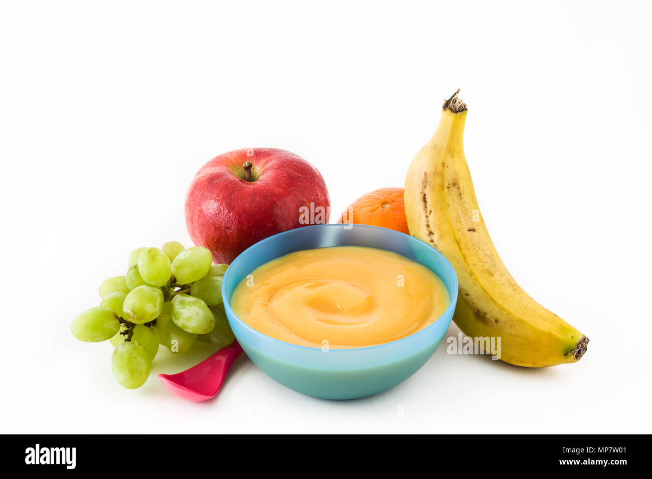 Baby food: colorful bowl of fruit puree isolated on white background ...