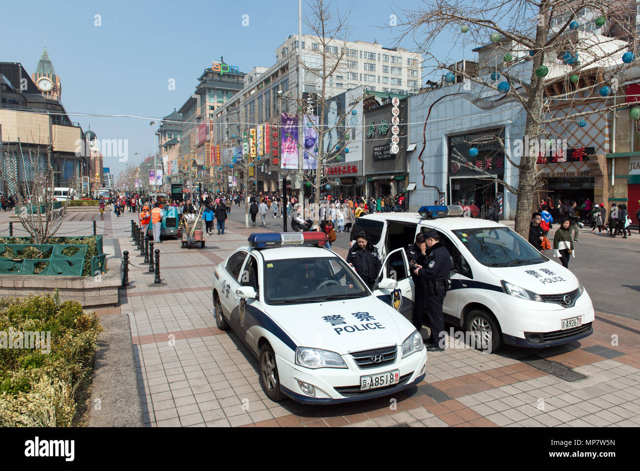 Two police cars at Wangfujing street at Beijing China Stock Photo - Alamy