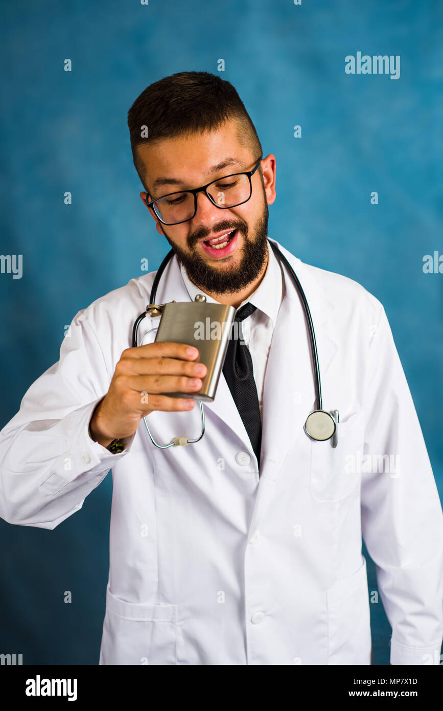 Man holding a bottle of medicine hi-res stock photography and images ...