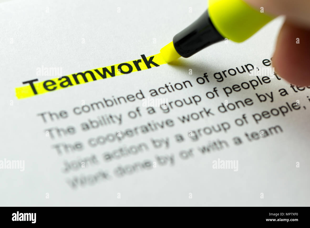 Teamwork highlighted in yellow Stock Photo - Alamy