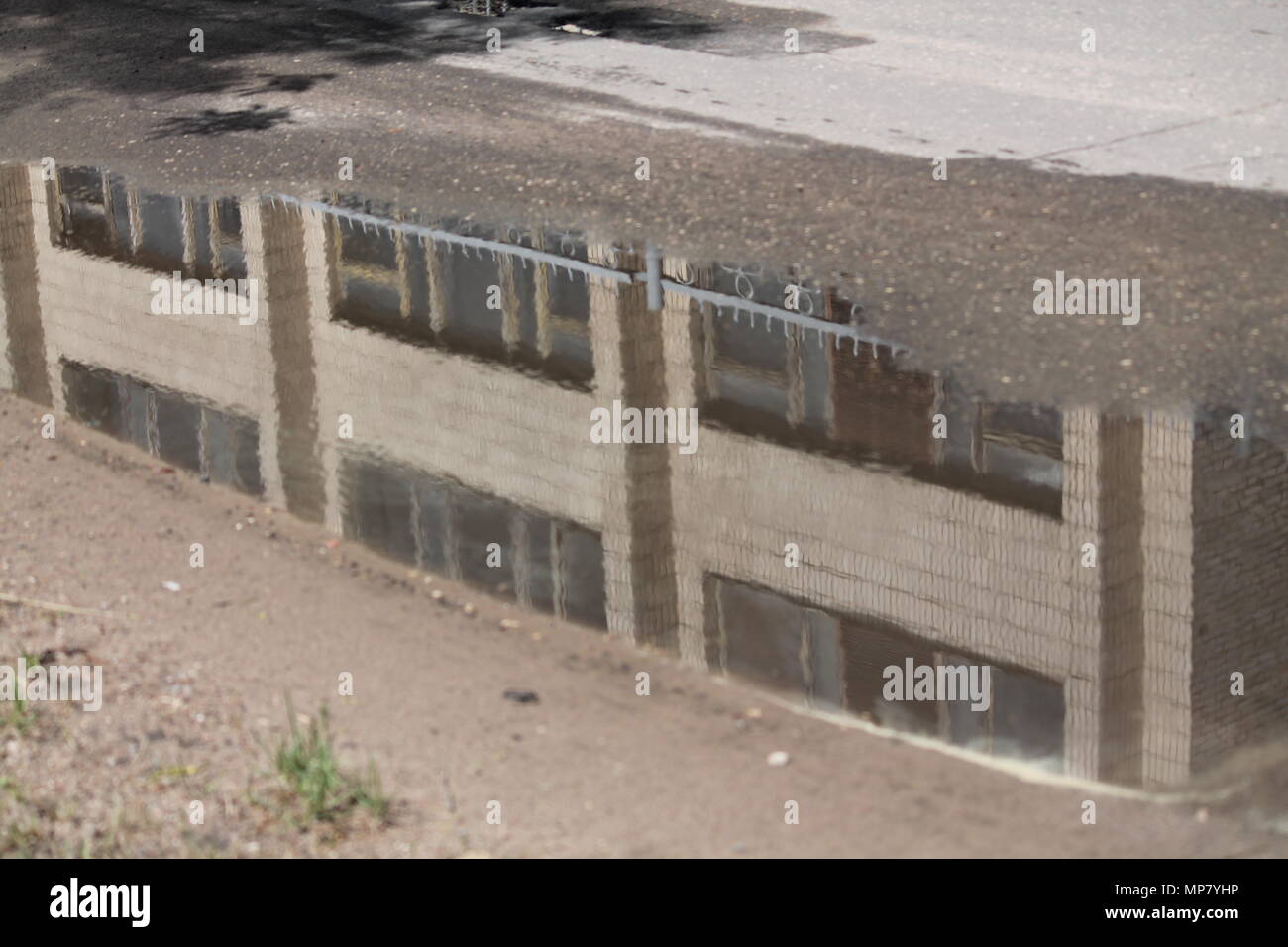 Rain puddle city hi-res stock photography and images - Alamy