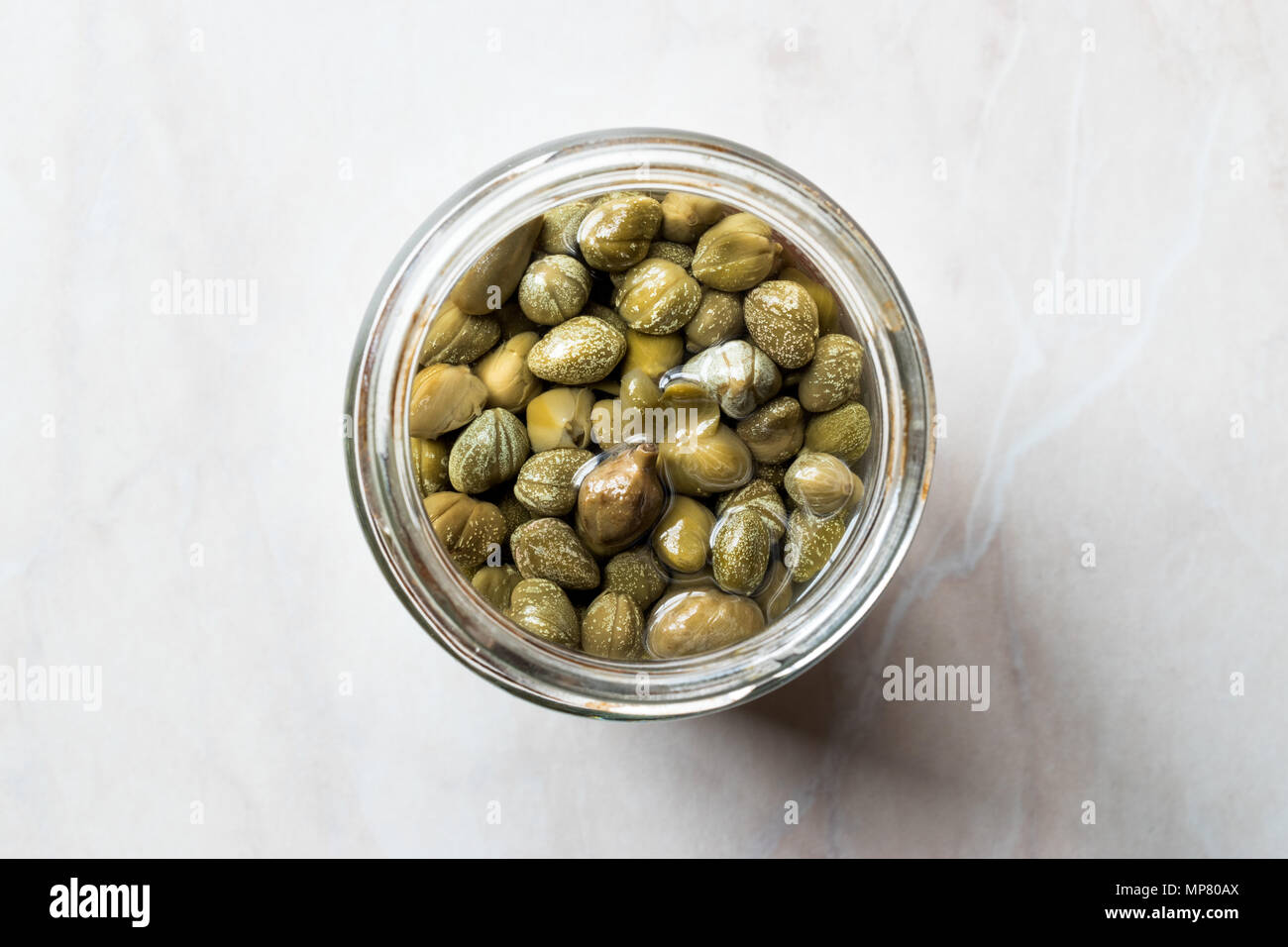 Jar of Capers in Glass Bowl. Organic Food Stock Photo - Alamy