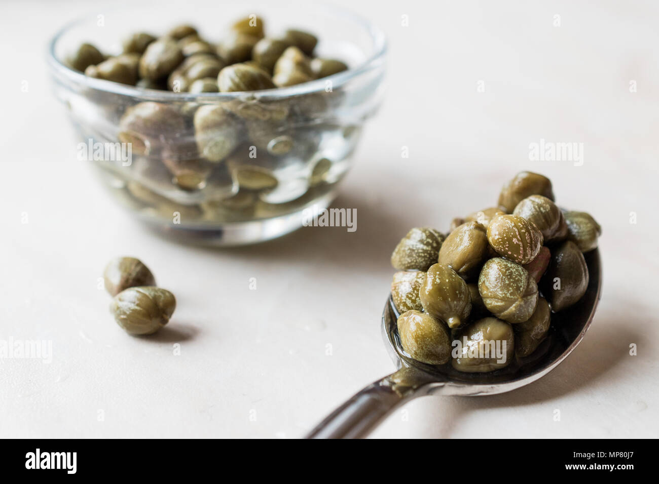 Edible Capers in Spoon Ready to Eat. Organic Food Stock Photo - Alamy