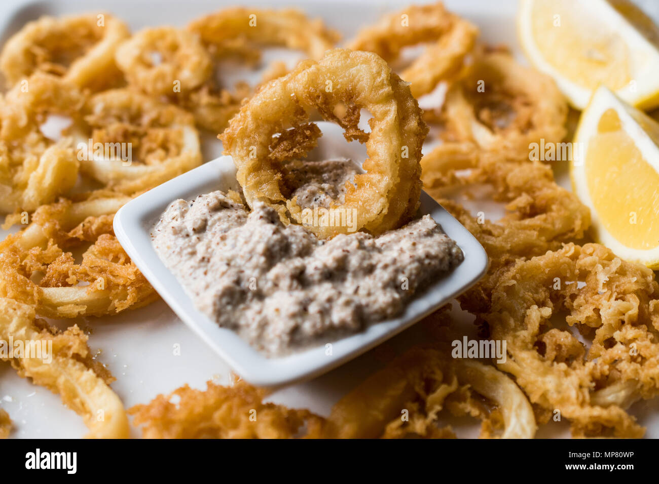 Fried Crispy Calamari Squid Rings with Tartar Sauce and Lemon. SeaFood ...