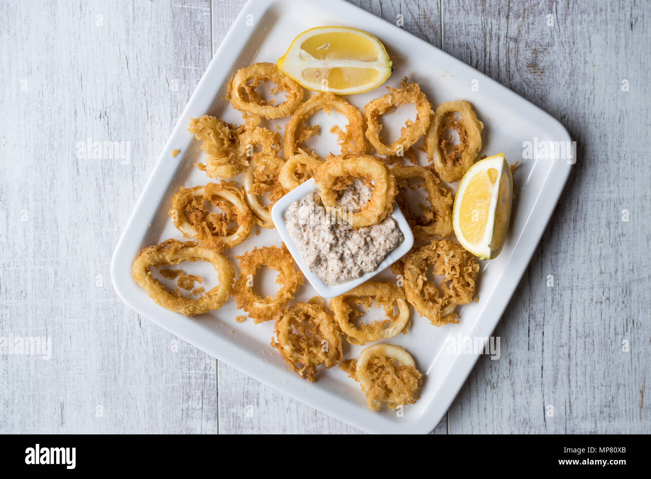 Fried Crispy Calamari Squid Rings with Tartar Sauce and Lemon. SeaFood ...
