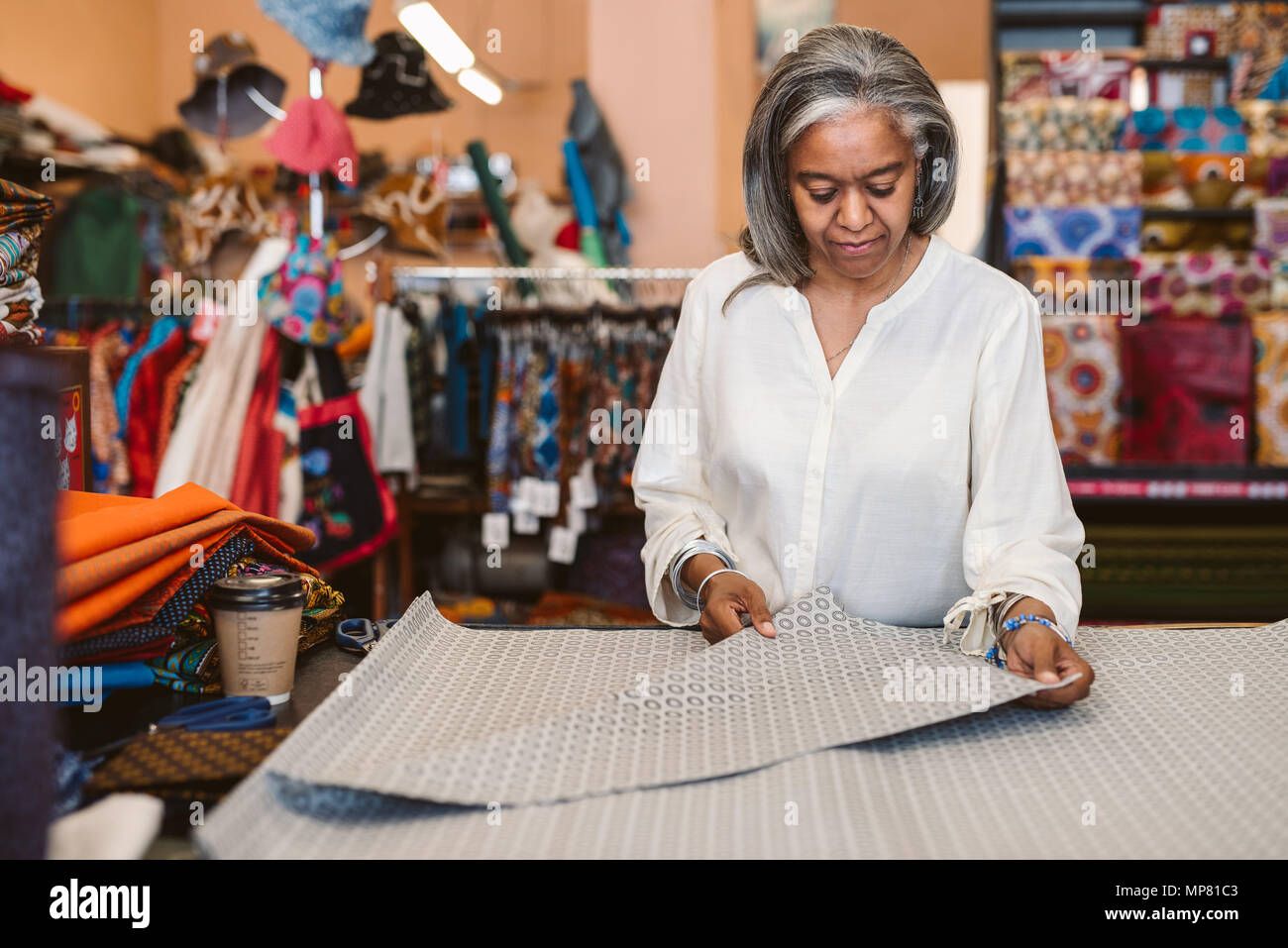 African woman tailor hi-res stock photography and images - Alamy