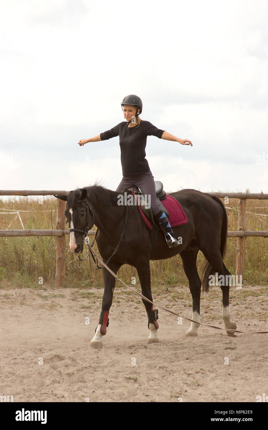 girl riding a horse Stock Photo - Alamy