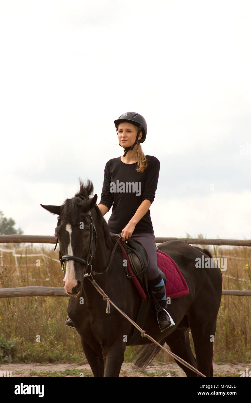 girl riding a horse Stock Photo - Alamy