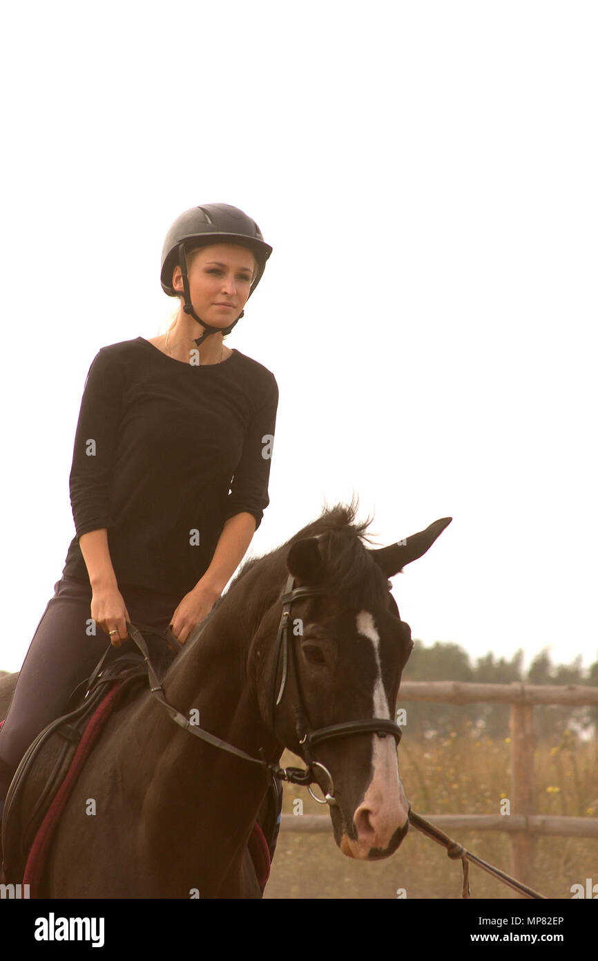 girl riding a horse Stock Photo - Alamy