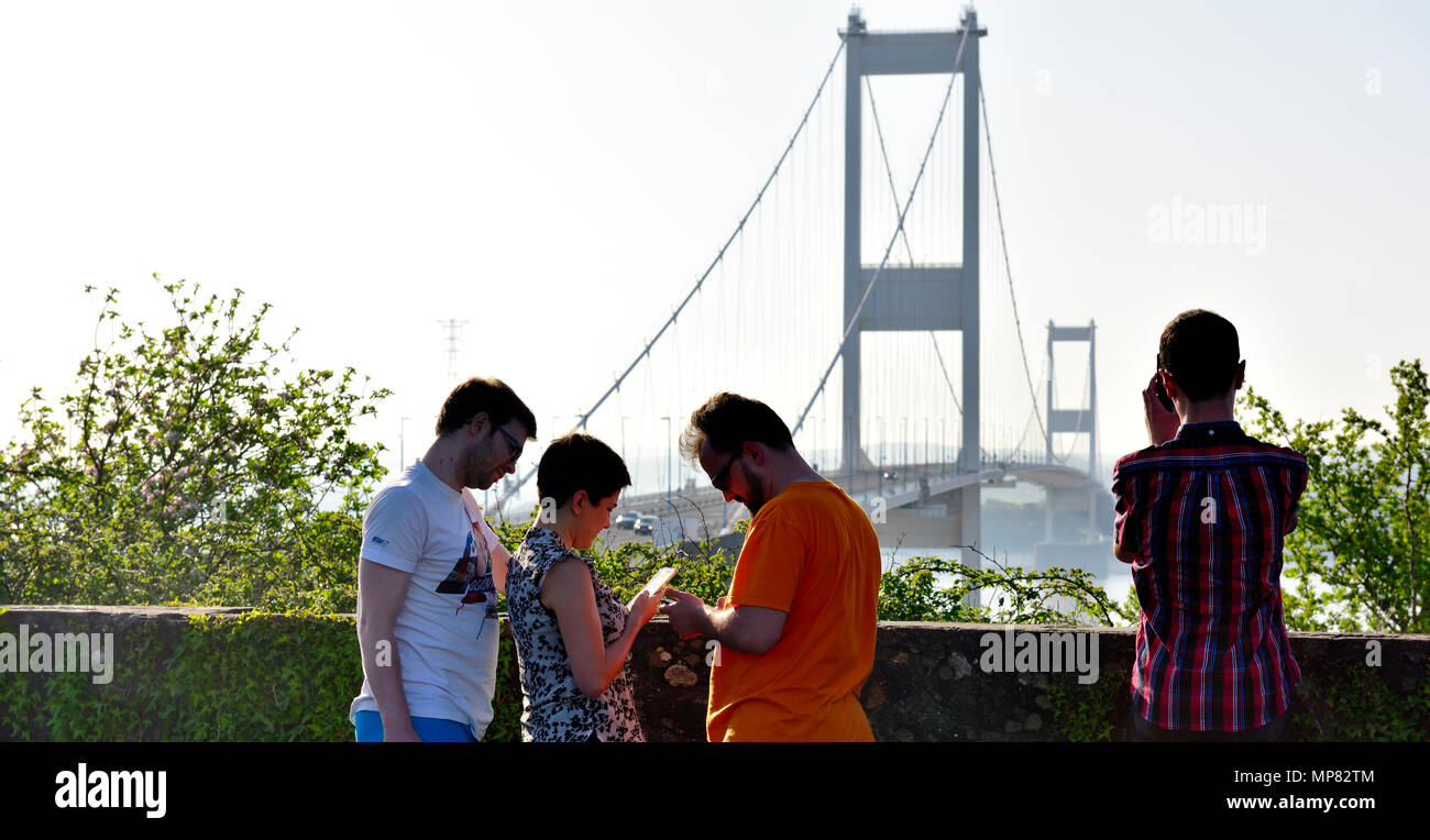 Spectators viewing the old 1966 toll road bridge across the Rivers ...