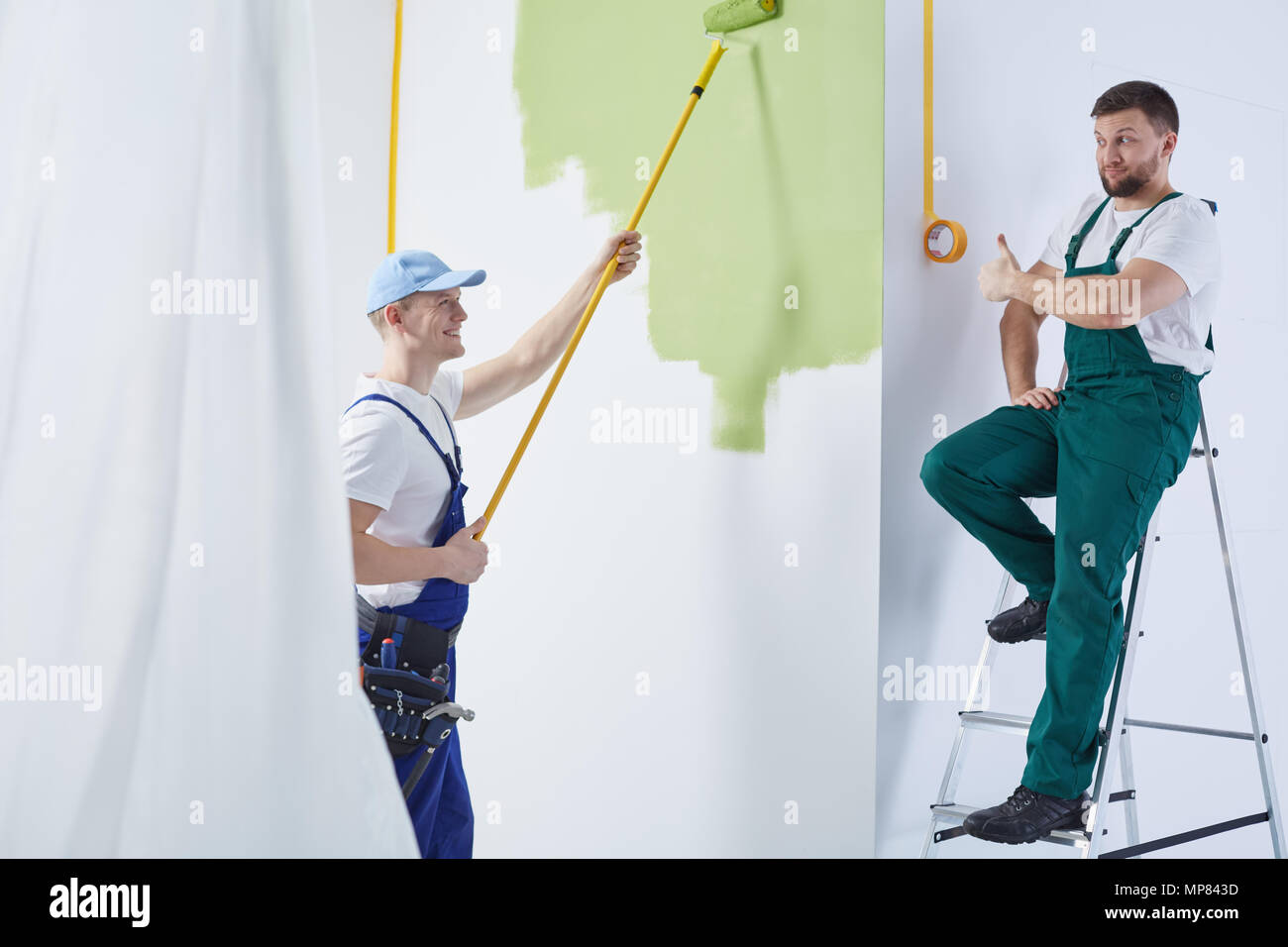 Construction Workers Working Inside