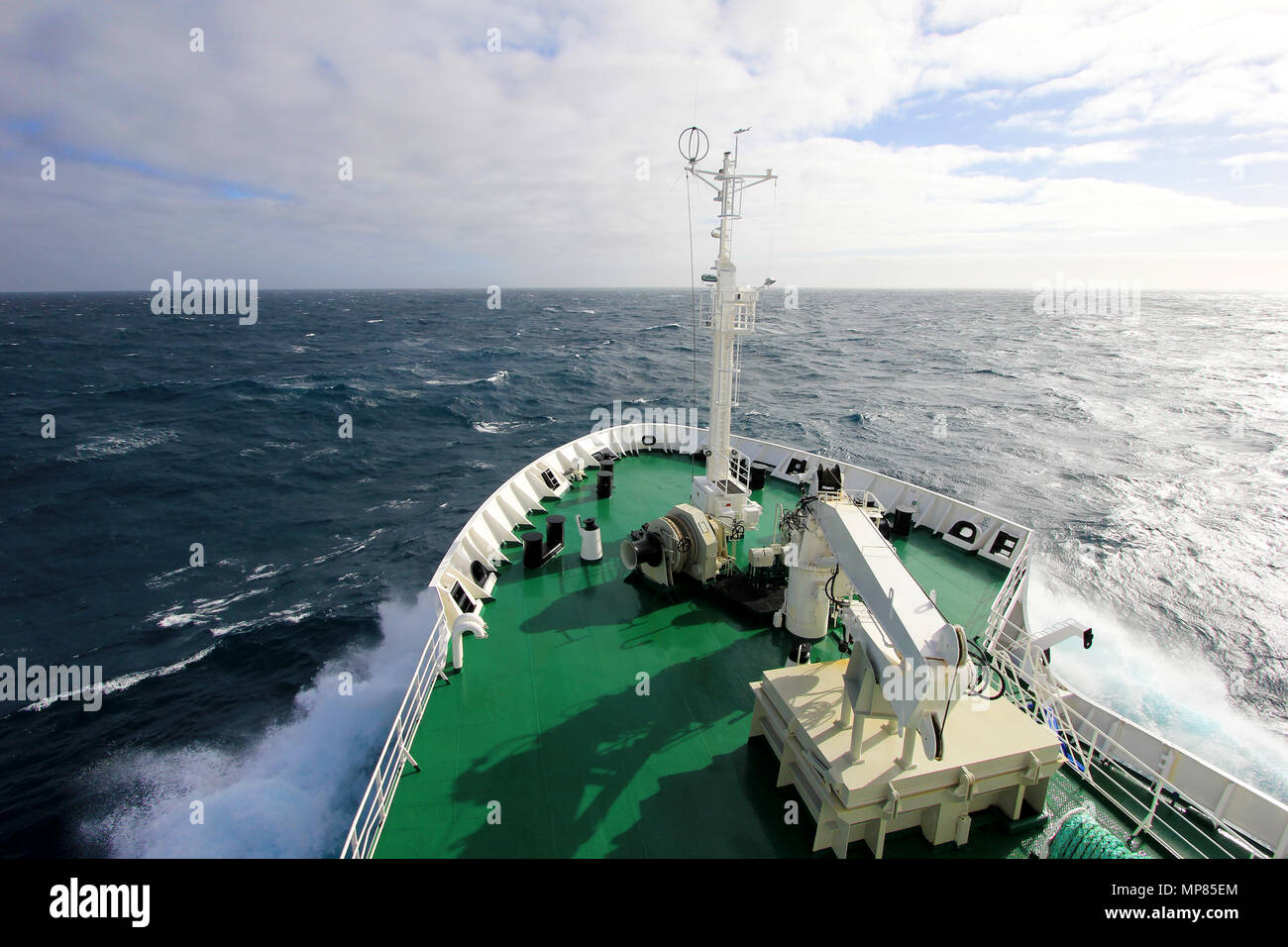Ship bow diving into a big splashing wave, Antarctic Peninsula ...