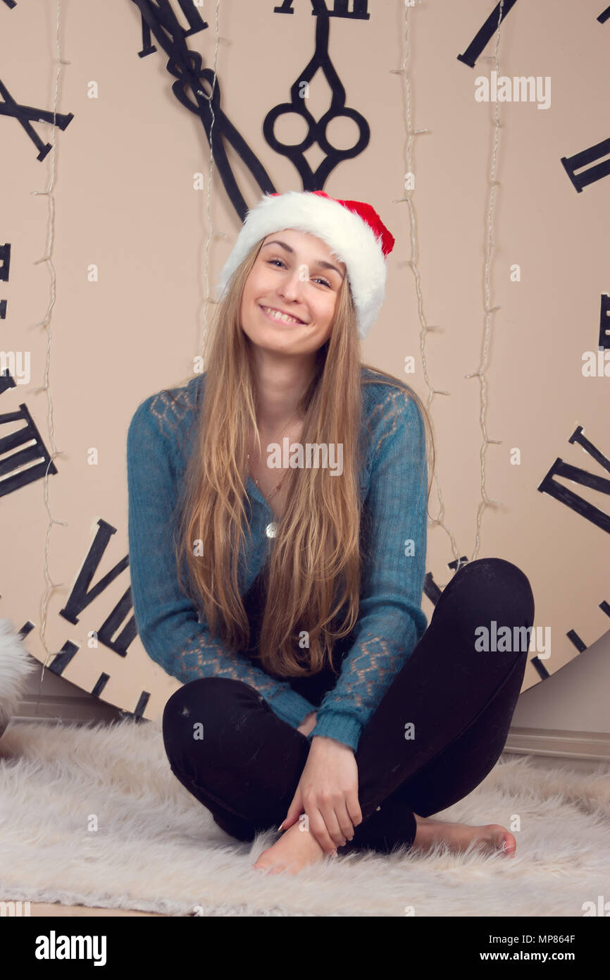 beautiful girl on clocks background lunch time Stock Photo - Alamy