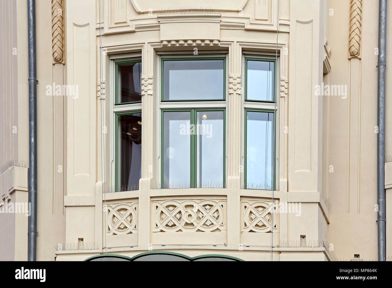 Triple Window at Beige Building in Ljubljana Stock Photo - Alamy