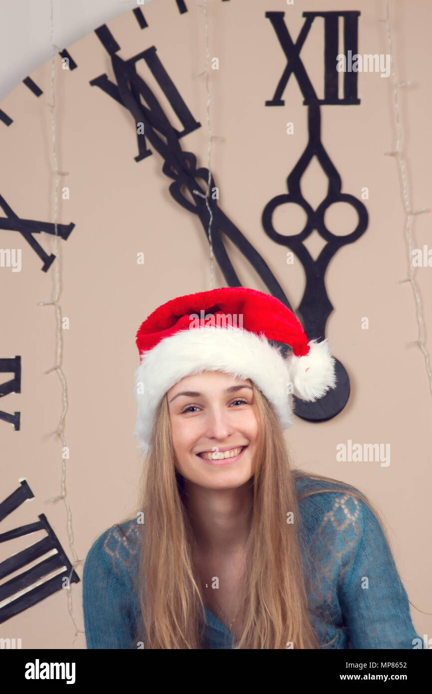 beautiful girl on clocks background lunch time Stock Photo - Alamy