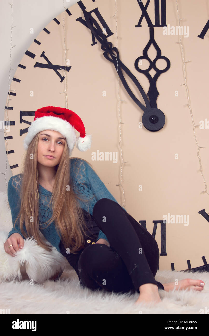 beautiful girl on clocks background lunch time Stock Photo - Alamy