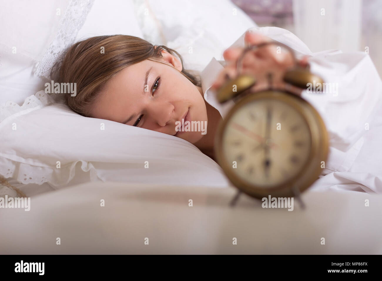 Woman switch of alarm hi-res stock photography and images - Alamy