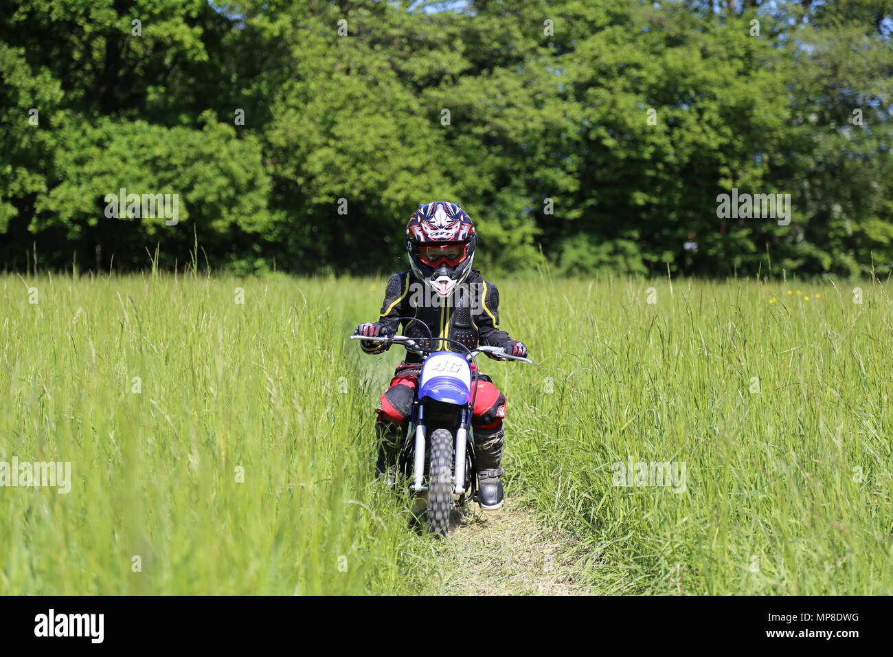 Kid on motorbike hi-res stock photography and images - Alamy