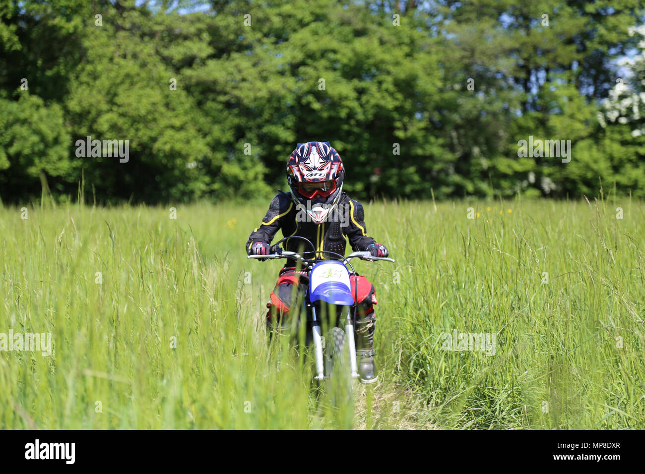 Kid on motorbike hi-res stock photography and images - Alamy