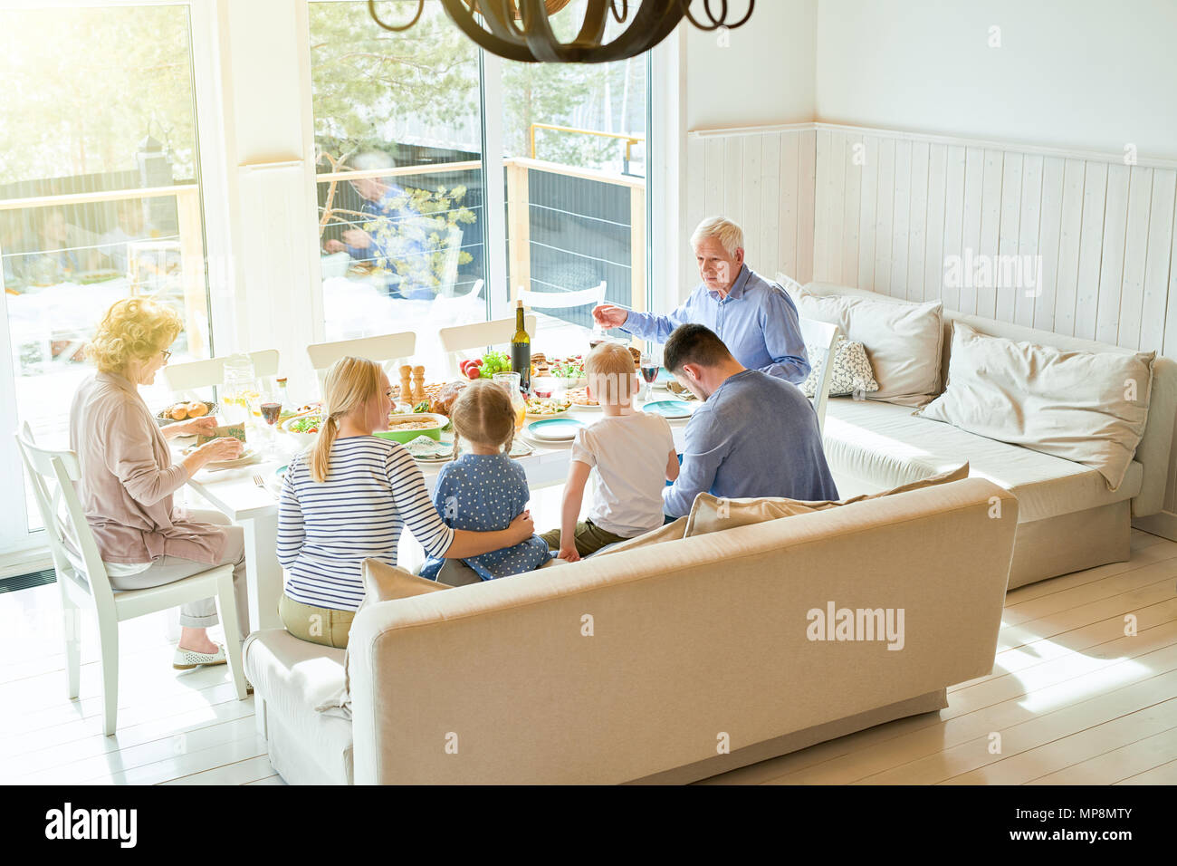 Family meeting table hi-res stock photography and images - Alamy