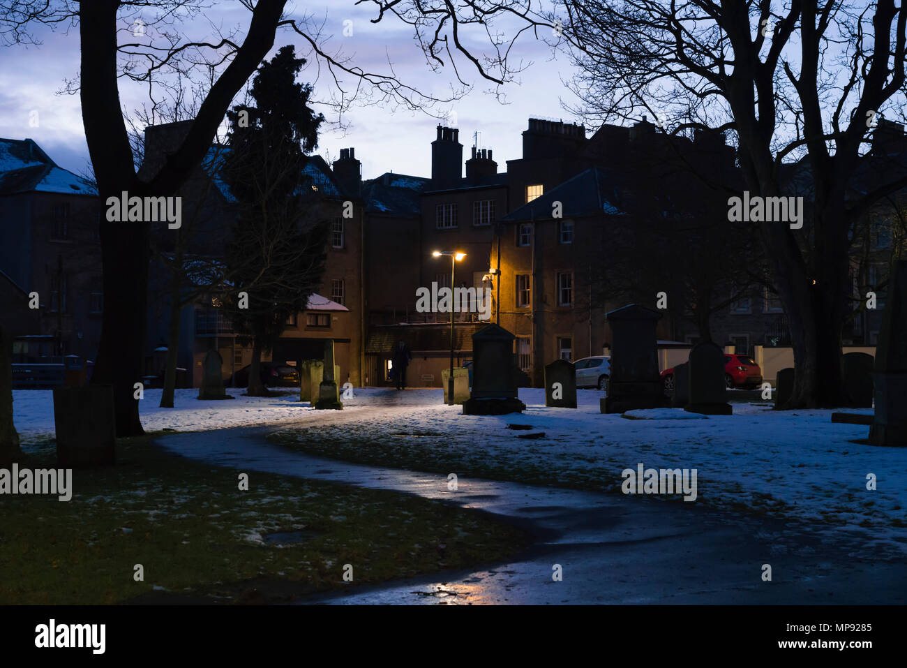 In Kelso churchyard, Scotland. At night, in winter snow Stock Photo - Alamy