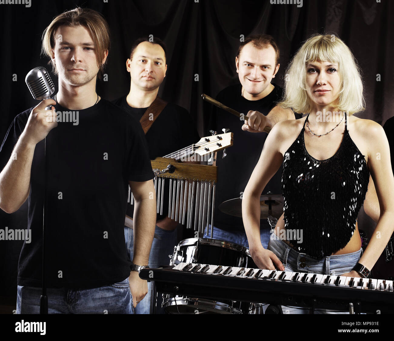 portrait of a student musical group in rehearsal Stock Photo - Alamy