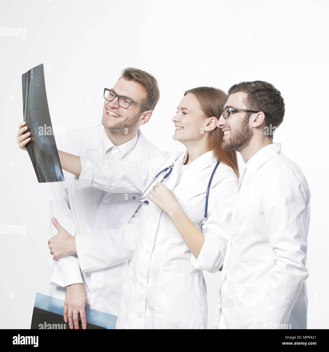 group of smiling doctors discussing x-rays .isolated on white Stock ...