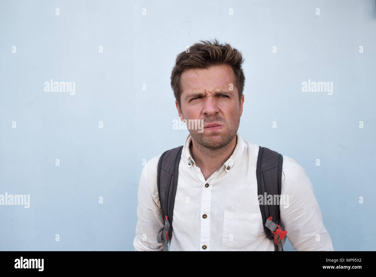 I don't know. Portrait of doubtful caucasian male looking with ...