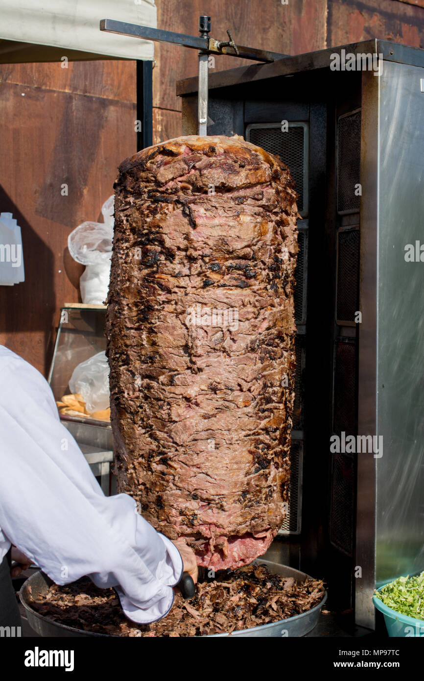 Traditional Turkish Doner Kebab on pole Stock Photo - Alamy