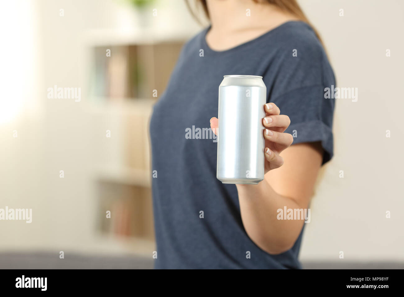 Hand holding can alcohol hi-res stock photography and images - Alamy
