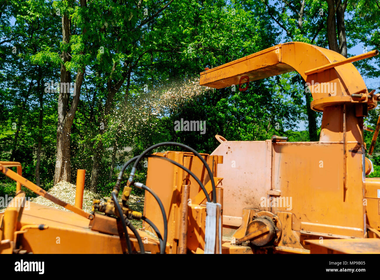 A tree chipper or wood chipper is a portable machine used for reducing ...