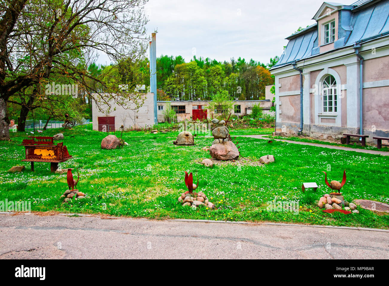 Rusty metal figures in Traku Voke public park in Vilnius, Lithuania ...